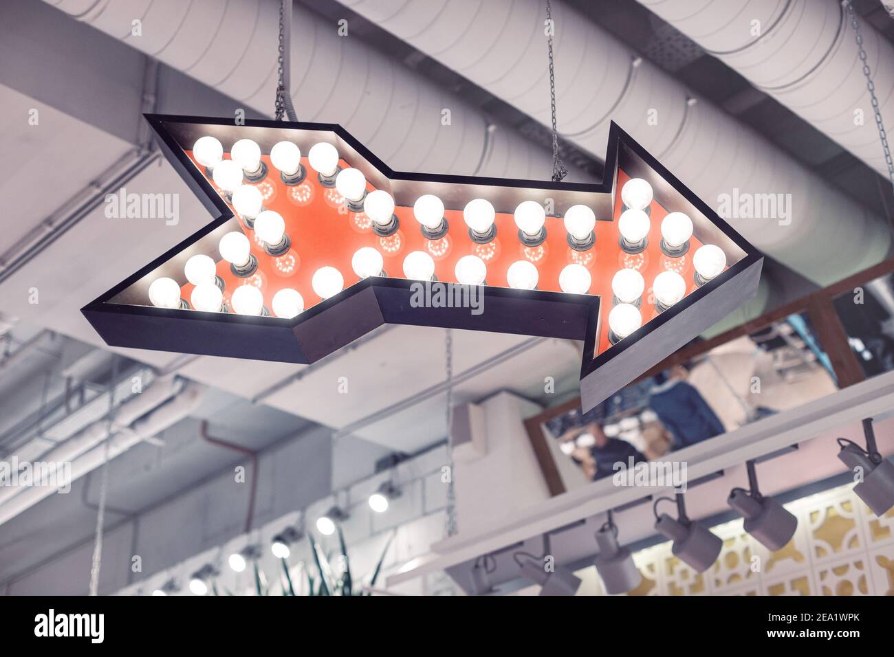 Retro arrow with lights points to the right Stock Photo - Alamy