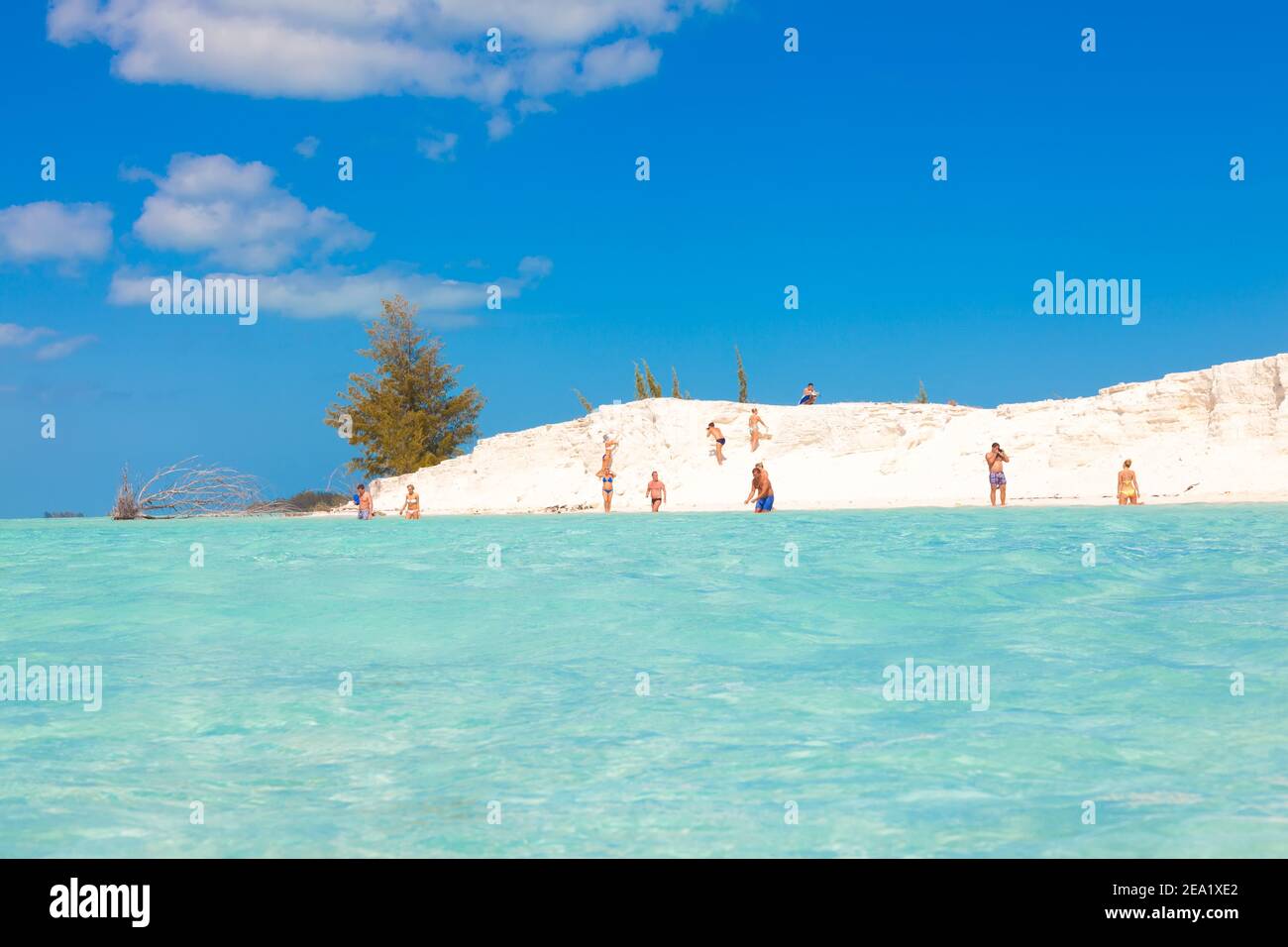 People on the beach. White sand and turquoise sea. Island Cayo Largo ...