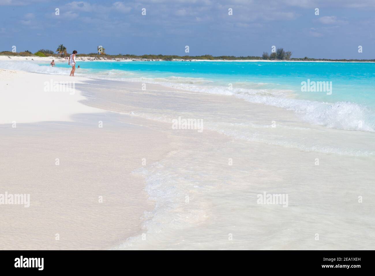 People on the beach. White sand and turquoise sea. Island Cayo Largo ...
