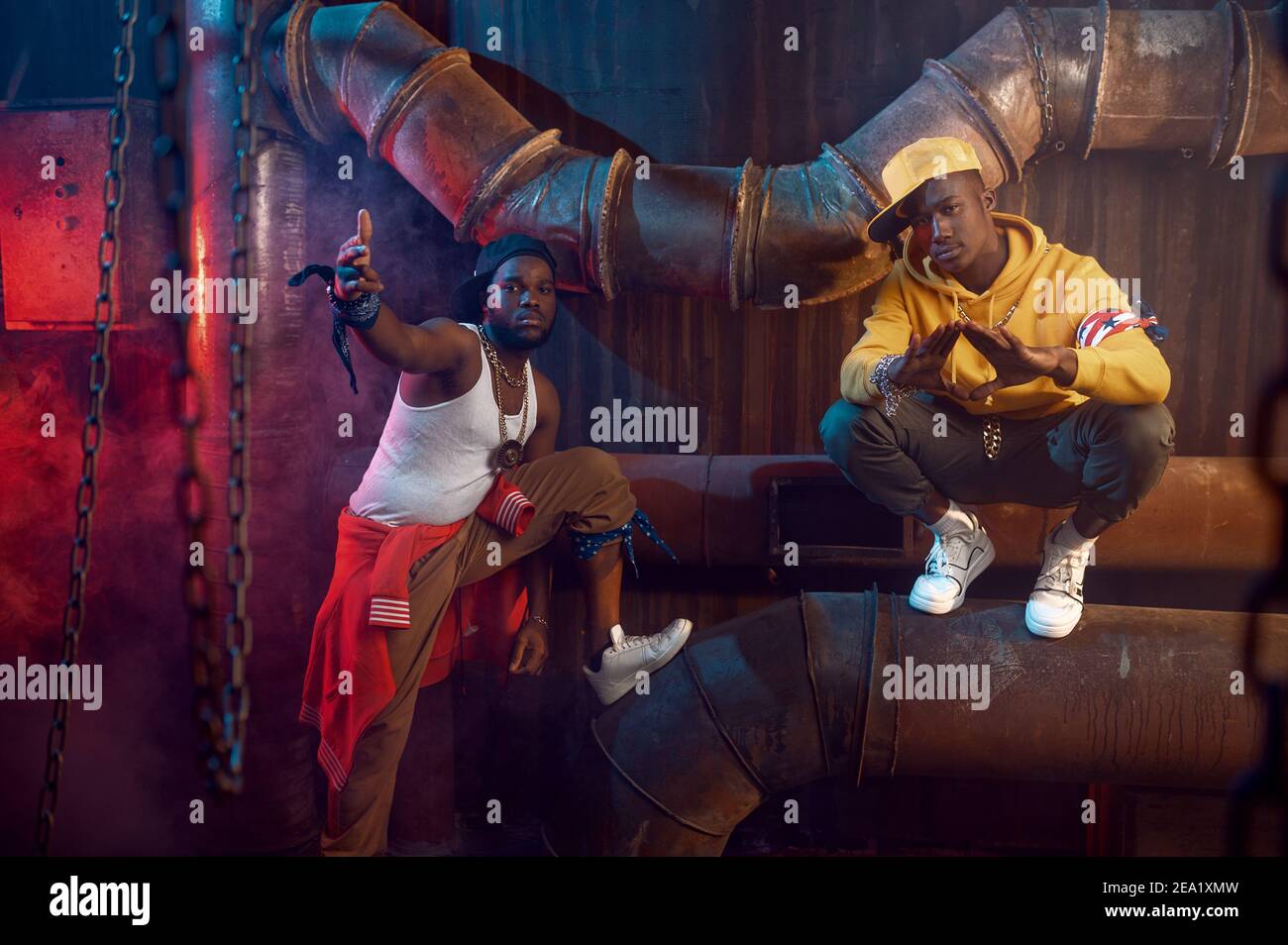 Serious rappers, break-dance performing in studio Stock Photo - Alamy