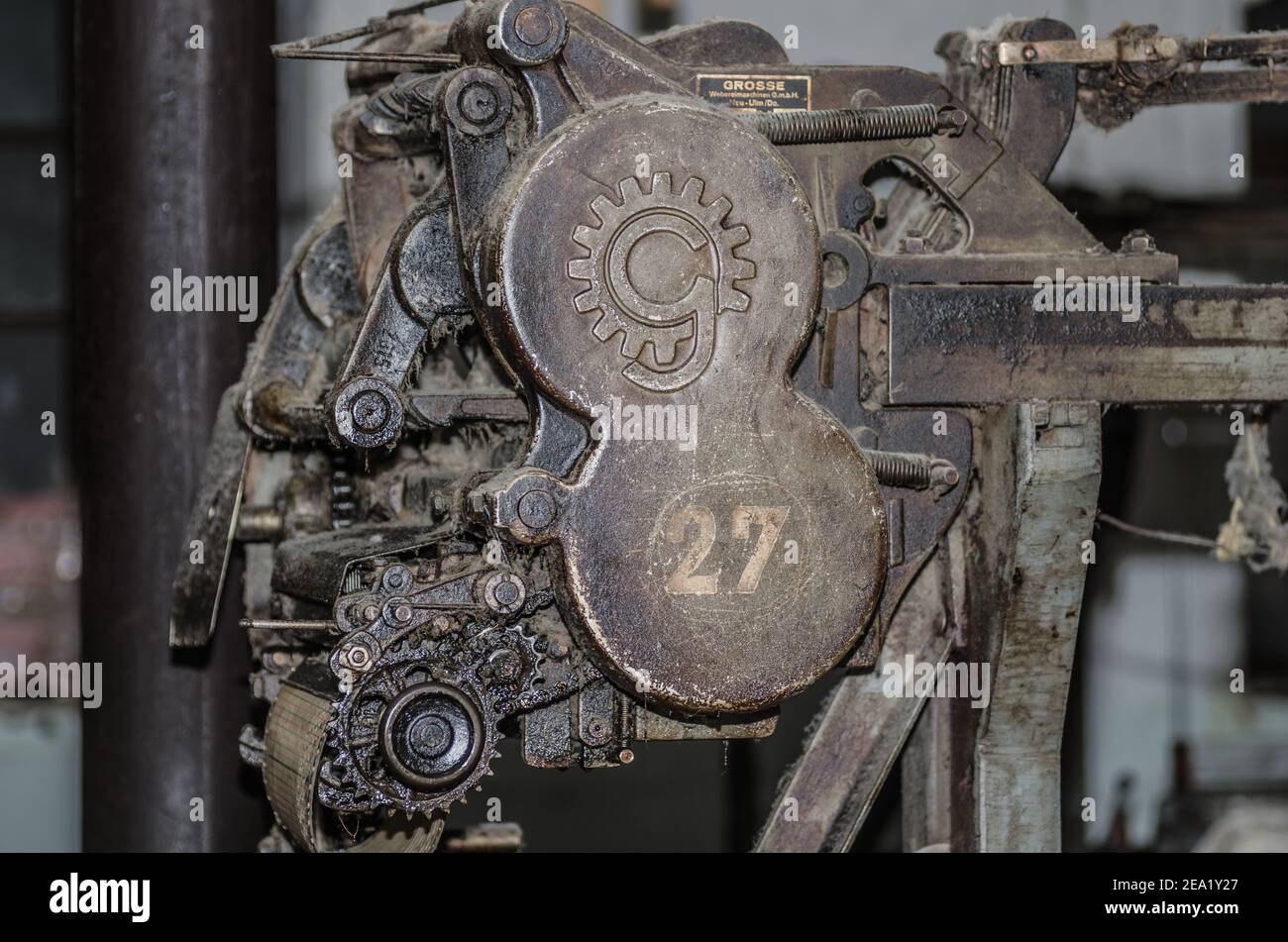 many oily gear wheels of age machine Stock Photo - Alamy