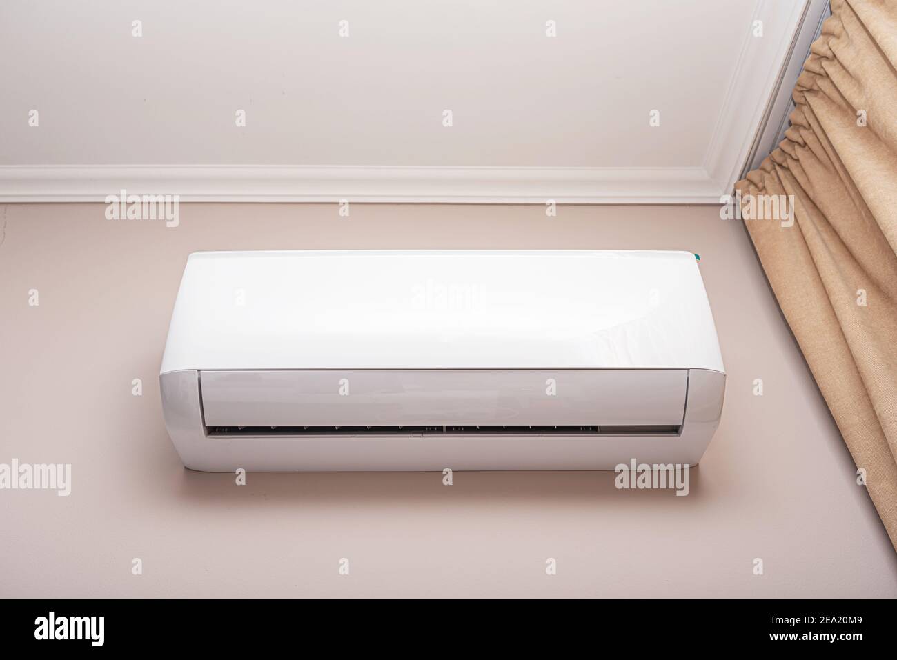 Split air conditioner on wall hi-res stock photography and images - Alamy