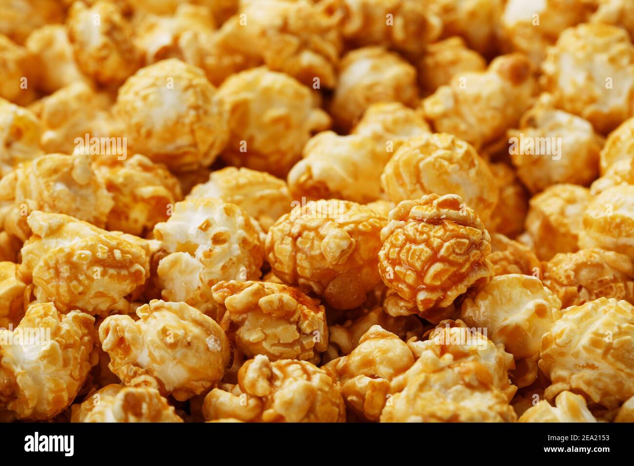 Caramel popcorn close-up as a background, full-screen texture ...