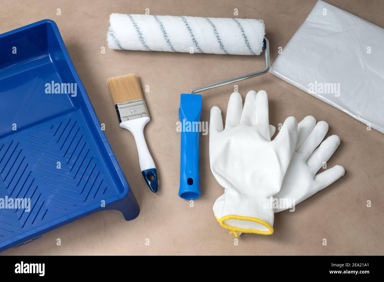 set of tools for painting brushes and roller Stock Photo - Alamy
