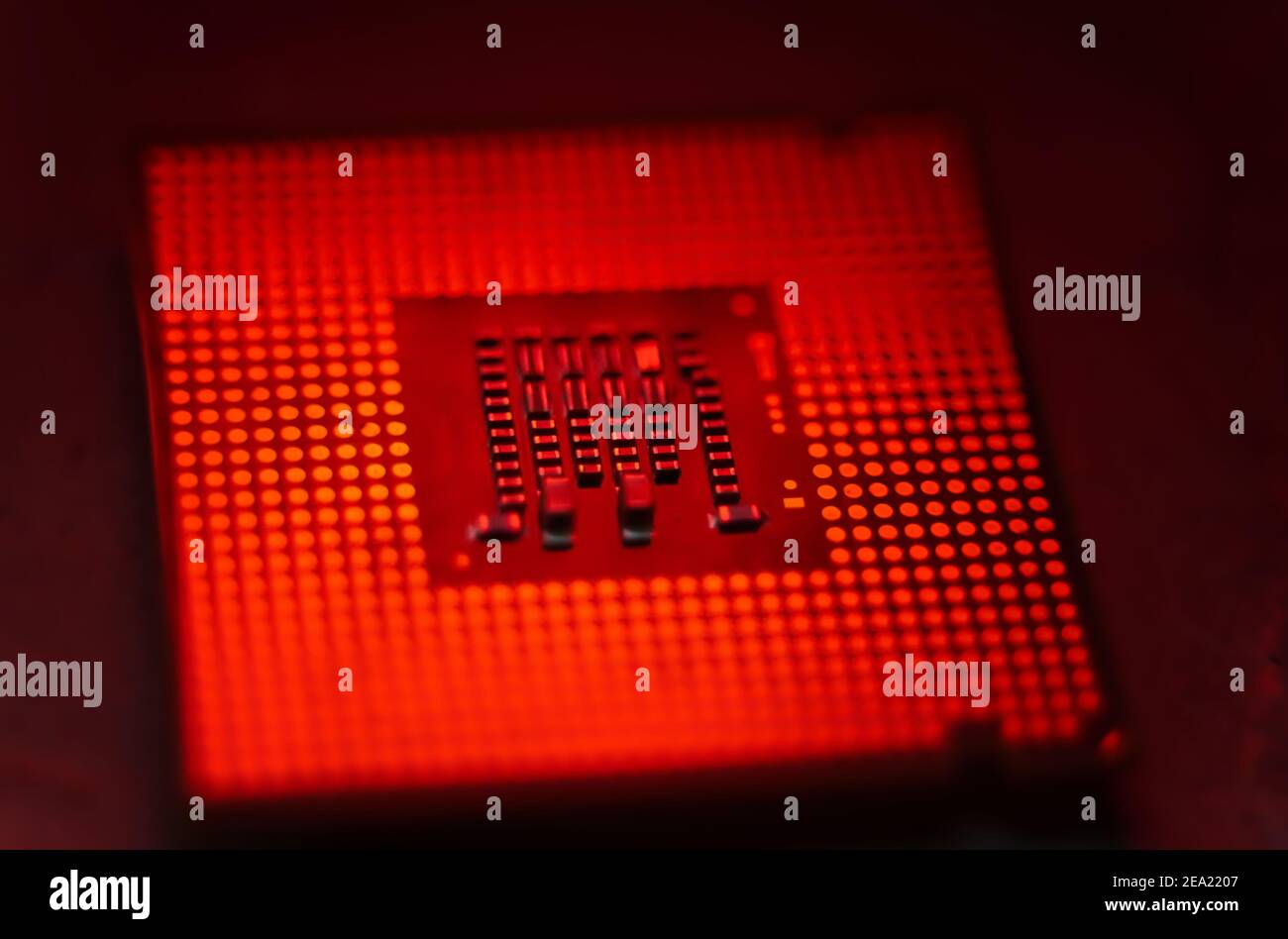 Close-up of CPU Chip Computer Processor in the lab with red dramatic ...