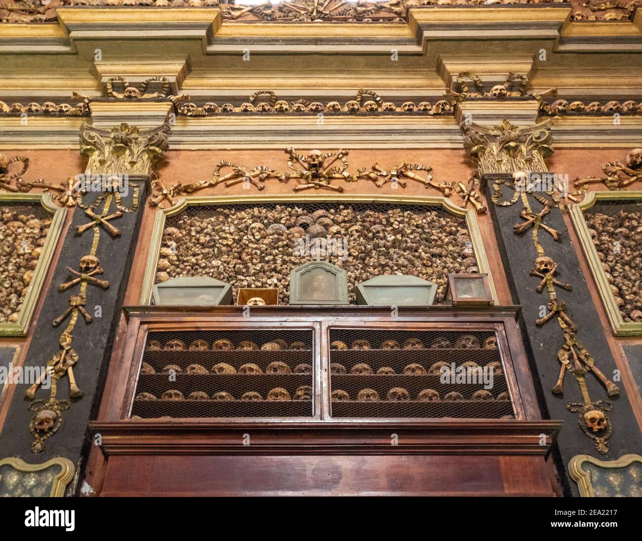 walls ornate with bones and skulls in San Bernardino alle Ossa, 13th ...