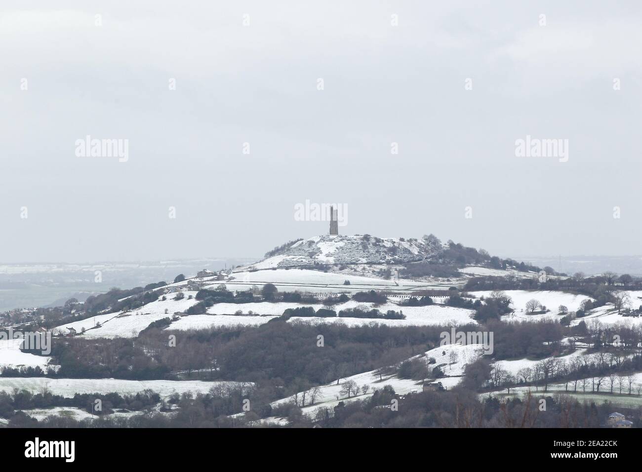 Snow covers the landscape surrounding Castle Hill in Huddersfield.Many ...