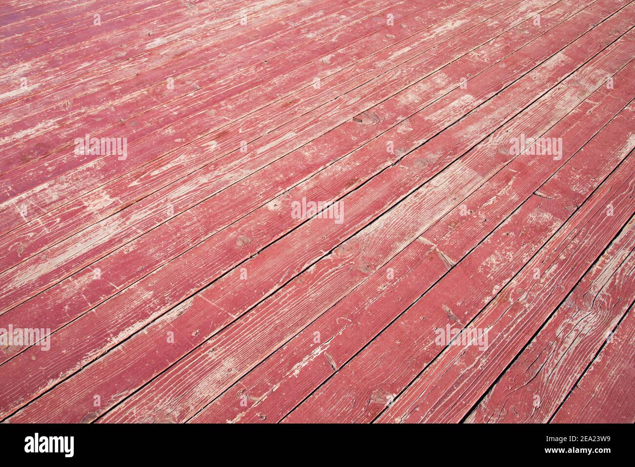 Old wooden red floor texture closeup. Diagonal planks with peeling ...