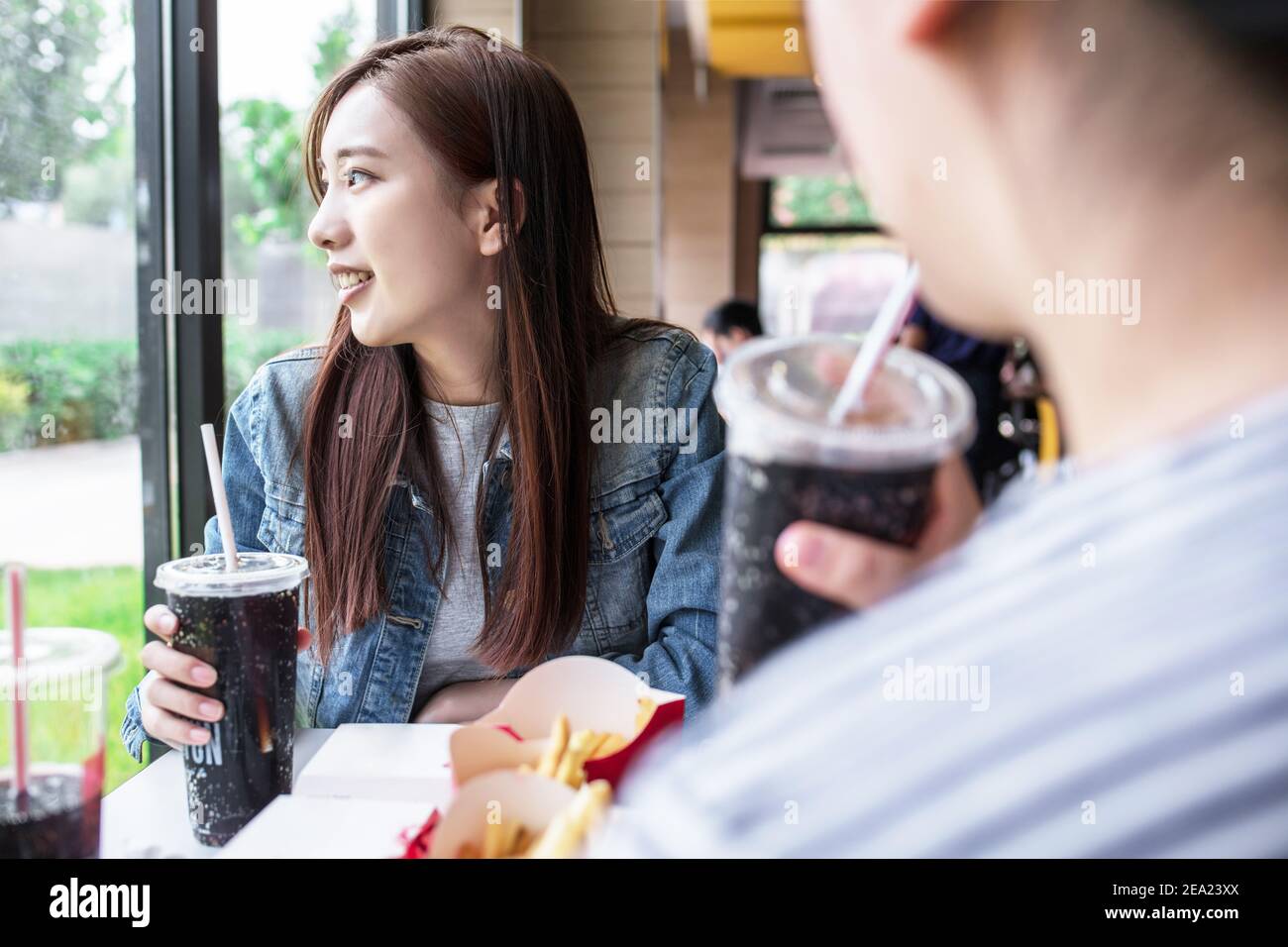 young women at a lunch in a restaurant Stock Photo - Alamy
