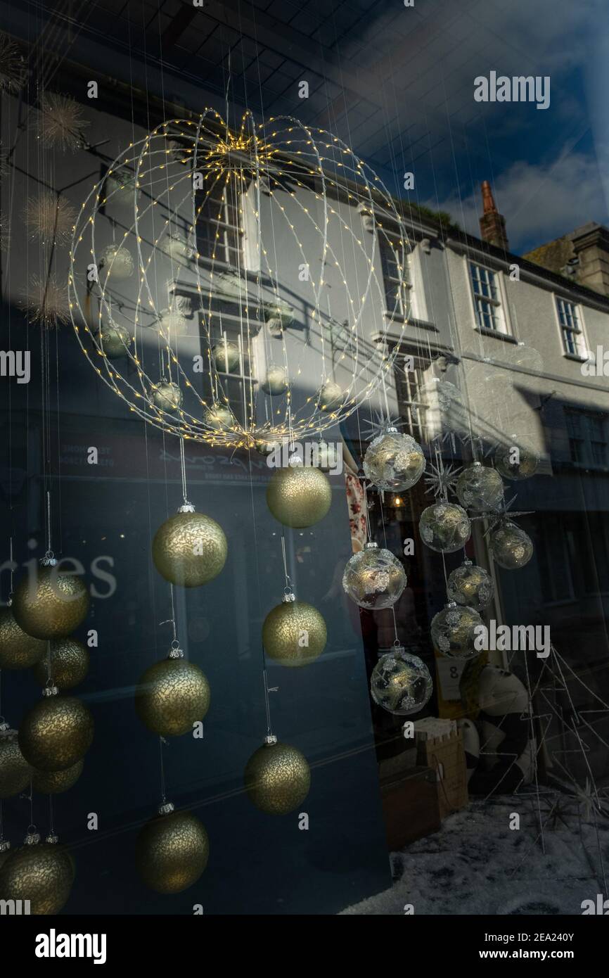 Christmas baubles and lit suspended ball of mini lights in Falmouth ...