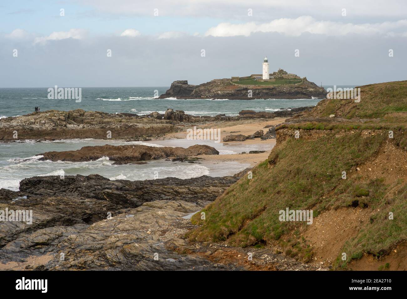 Godrevy lighthouse on its distant island in the sunshine, with a ...