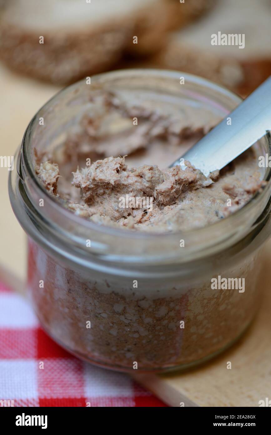 Liver sausage in glass with knife, homemade liver sausage Stock Photo ...