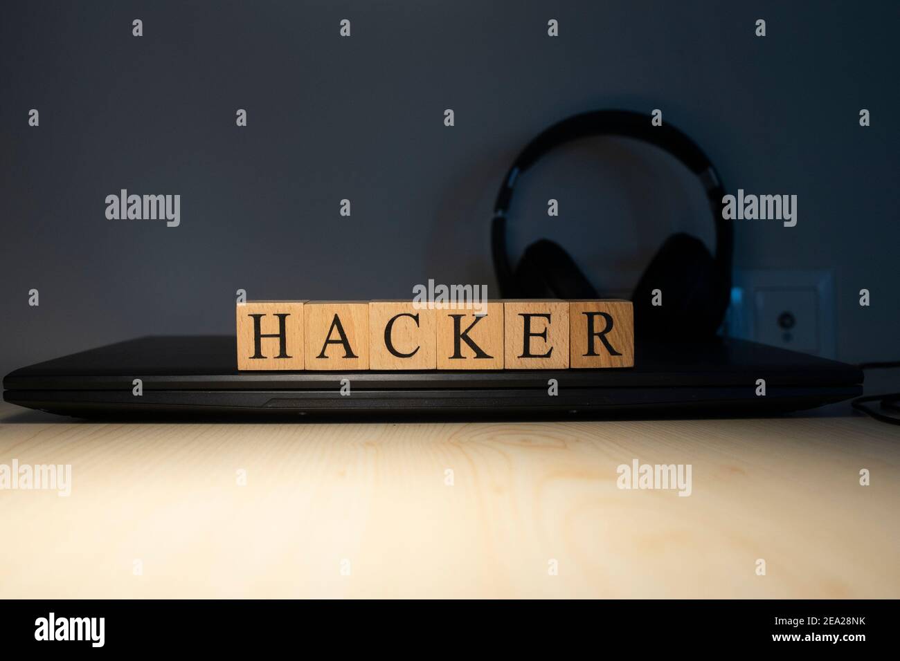 Hacker word on block concept. Close up Stock Photo - Alamy