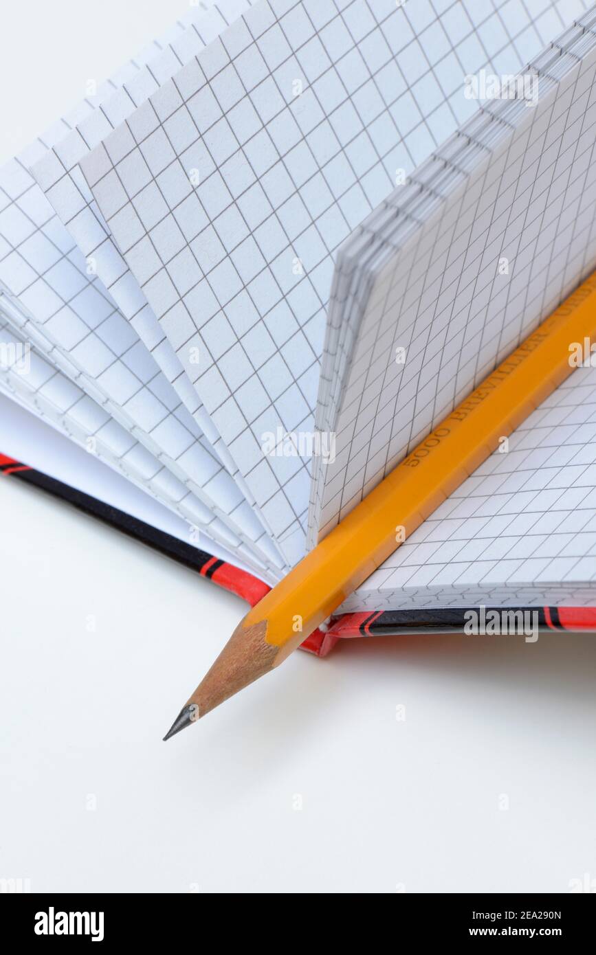 Pencil and notebook Stock Photo - Alamy