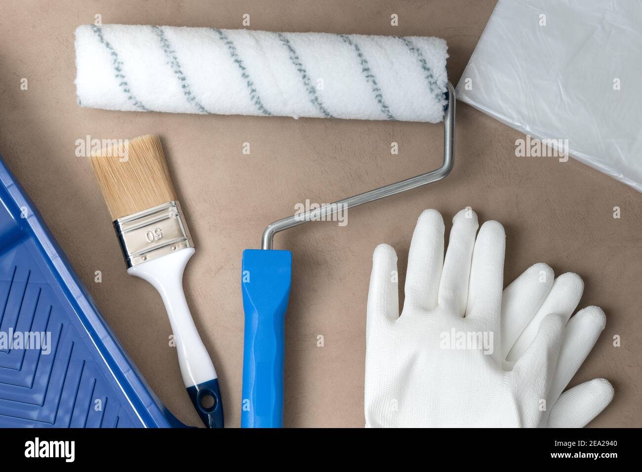 set of tools for painting brushes and roller Stock Photo - Alamy