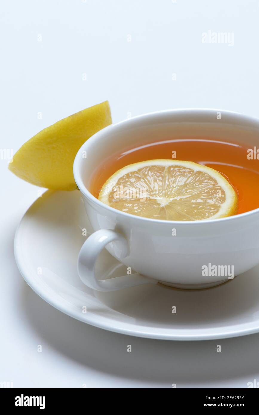 Cup of black tea with lemon Stock Photo - Alamy