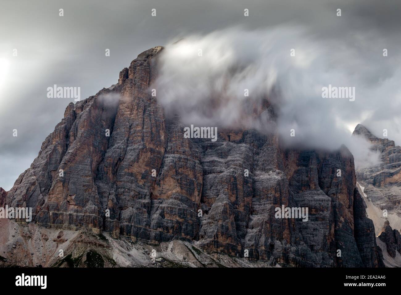 Moving cloud on Tofana di Rozes mountain peak. The Tofane group. The ...