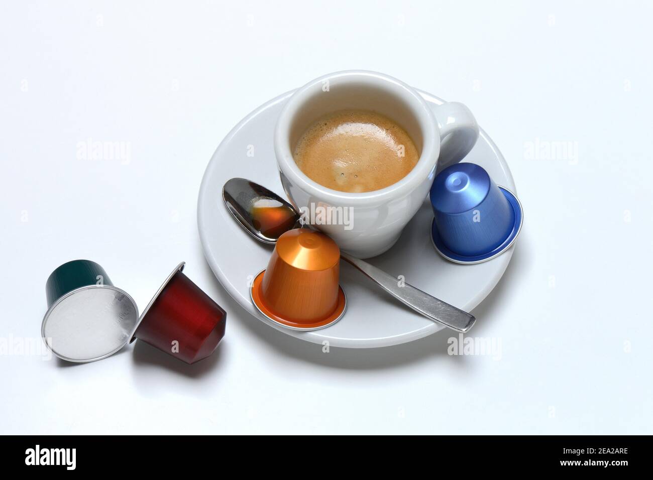 Coffee capsules and coffee cup with espresso Stock Photo - Alamy