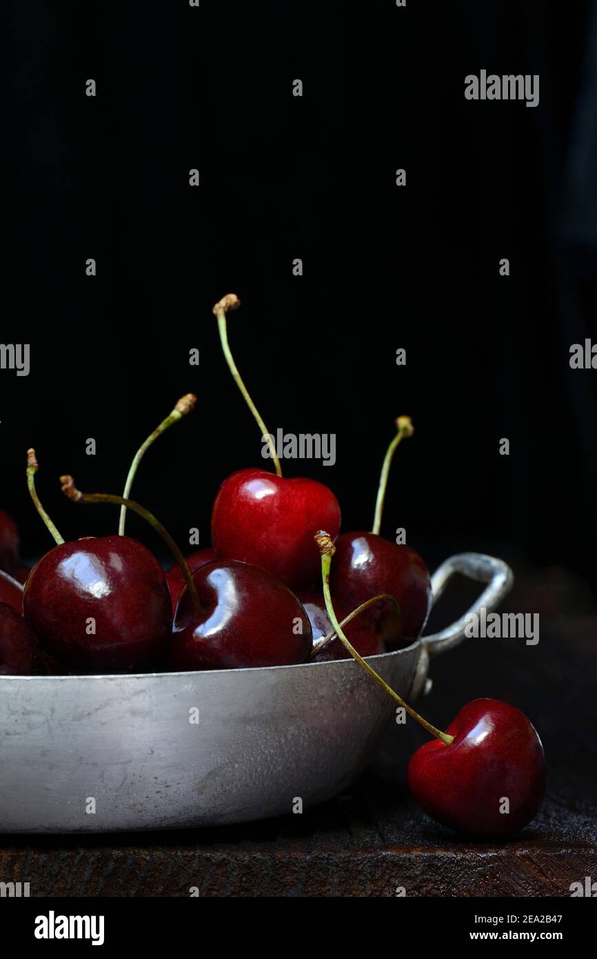 Wild cherries (Prunus avium) in a bowl Stock Photo - Alamy