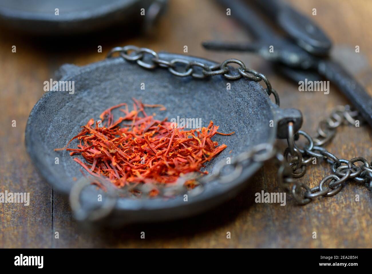 Saffron crocus threads (Crocus sativus) in weighing pan Stock Photo - Alamy
