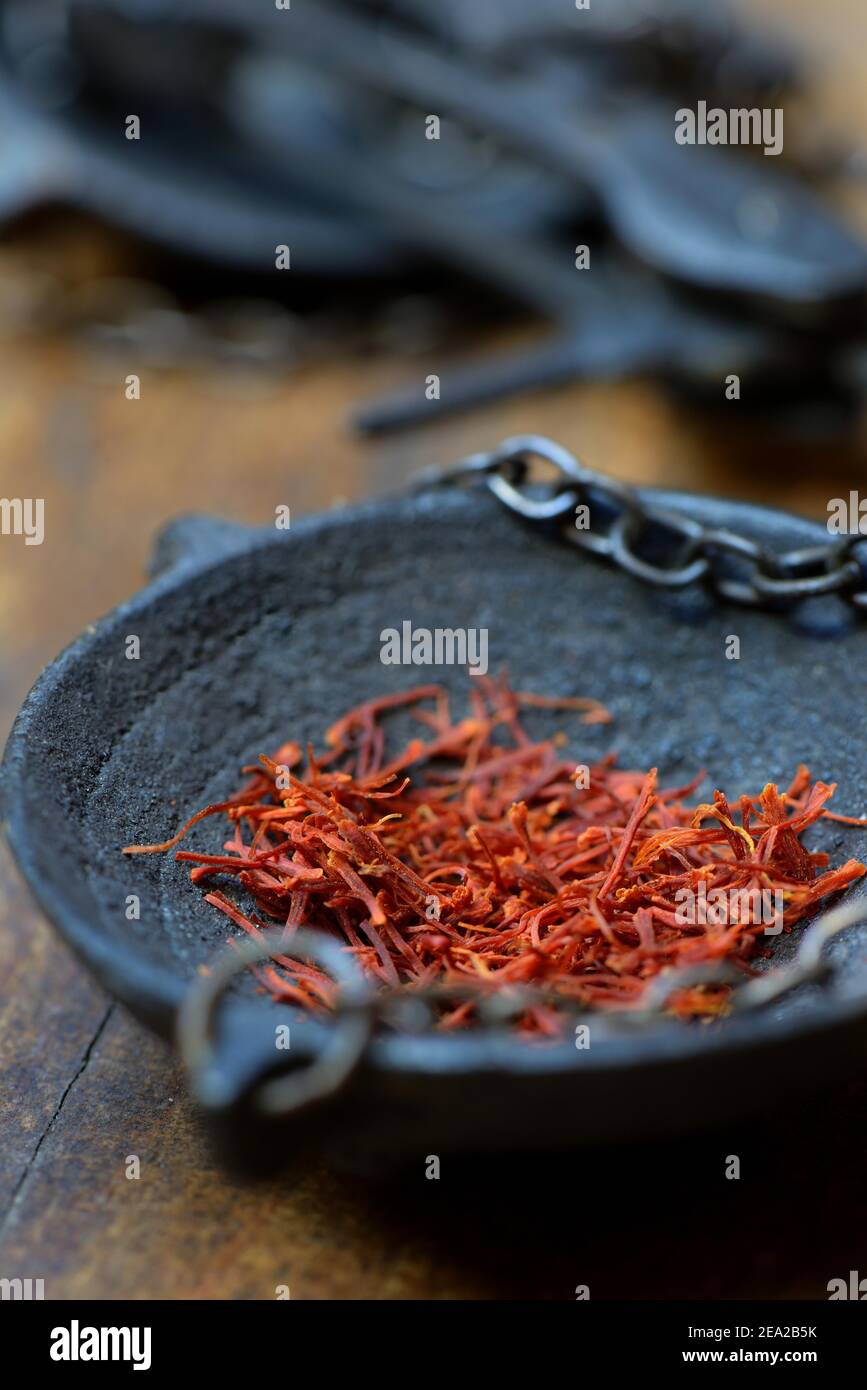 Saffron crocus threads (Crocus sativus) in weighing pan Stock Photo - Alamy