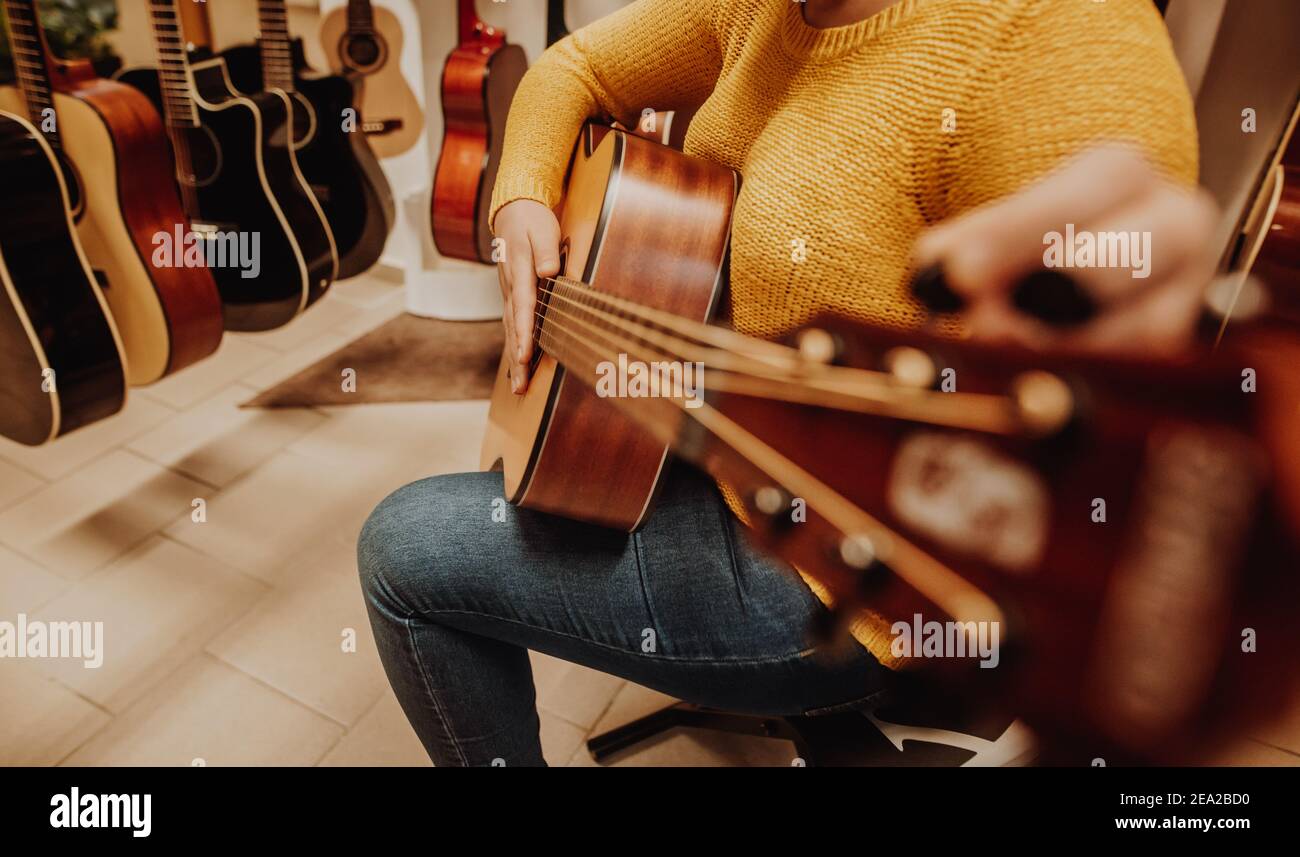 Buying Musical Instruments High Resolution Stock Photography and Images ...