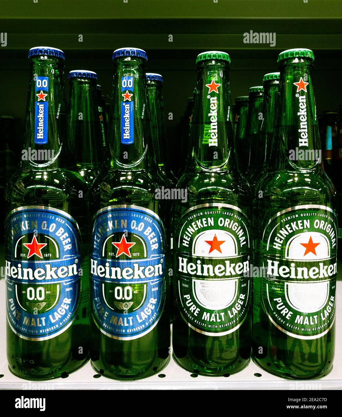 2021: Heineken bottled light beers standing in supermarket shelf Stock ...
