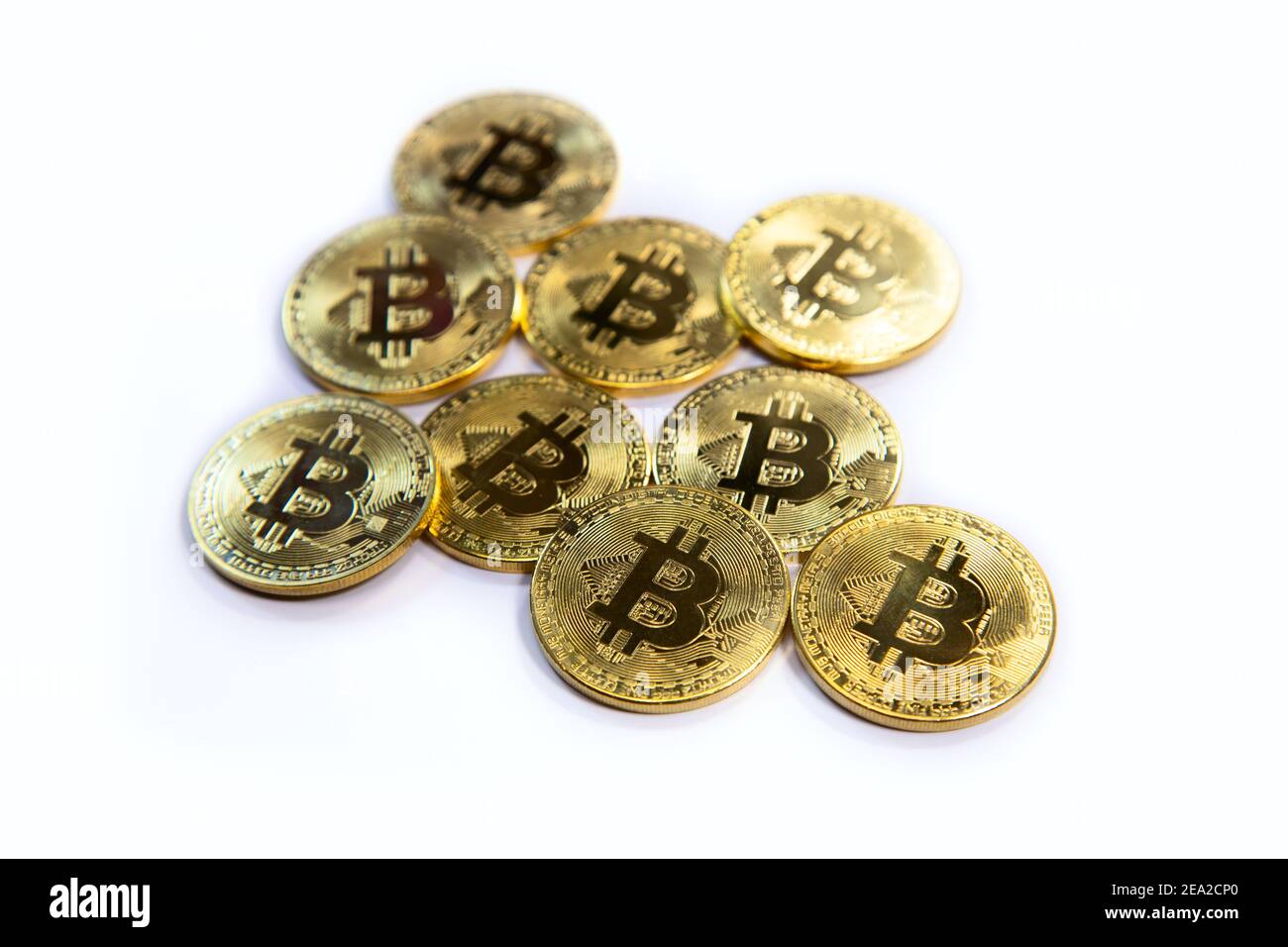 Bitcoins on the white background Stock Photo - Alamy