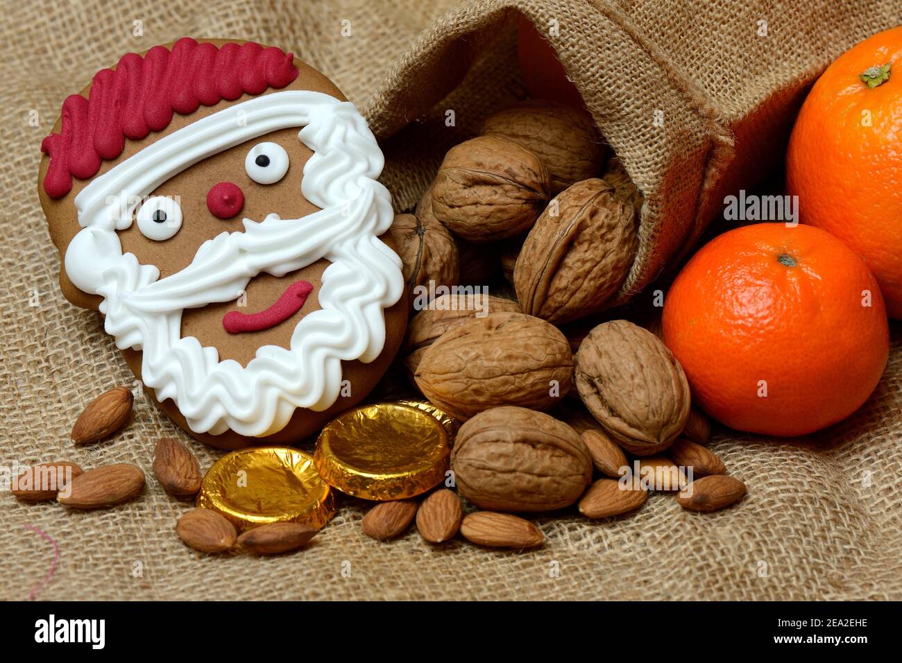 Gingerbread Santa's head, nuts and fruits for St. Nicholas Day, almonds ...
