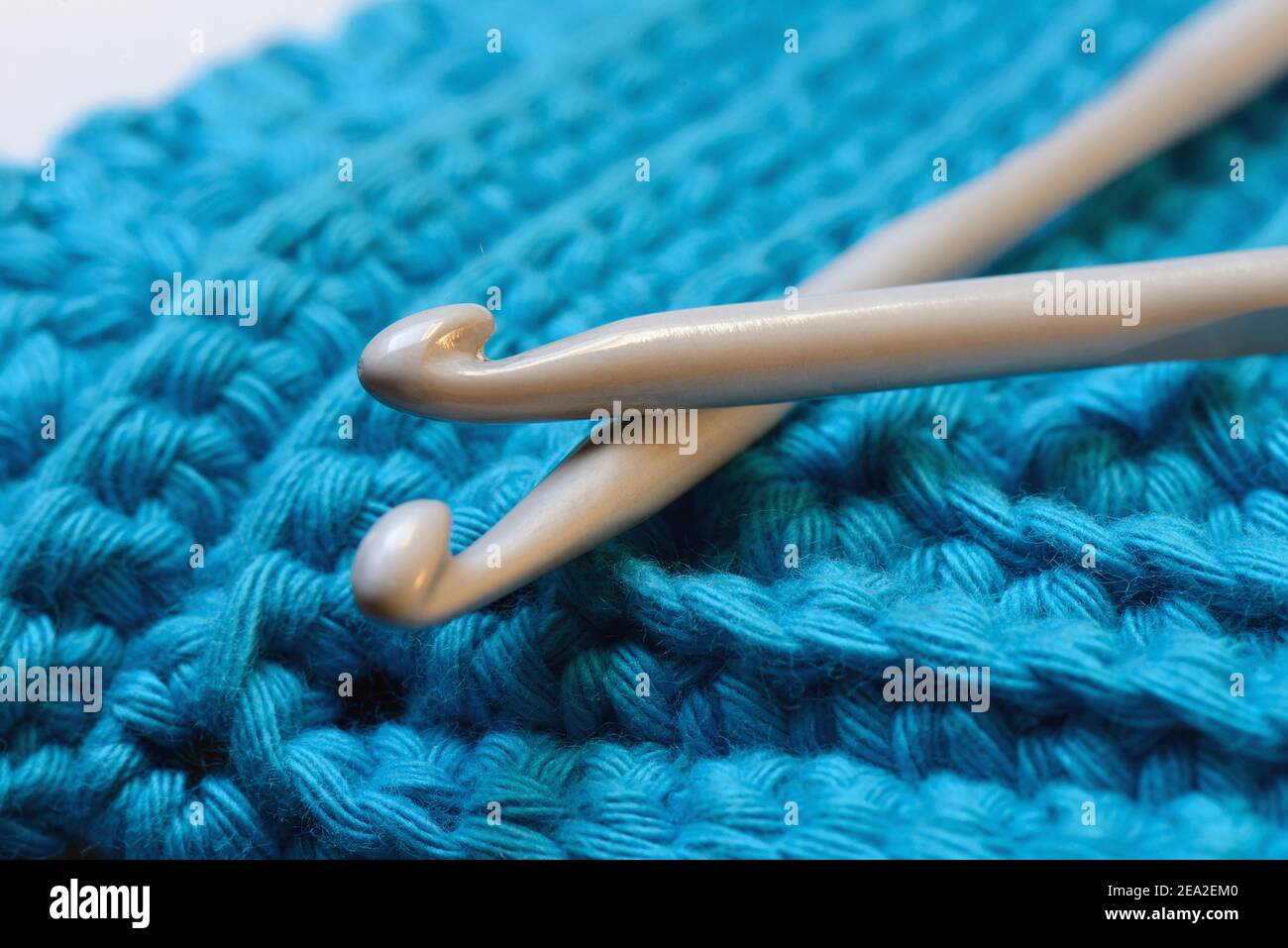 Crochet hooks with manual work Stock Photo - Alamy