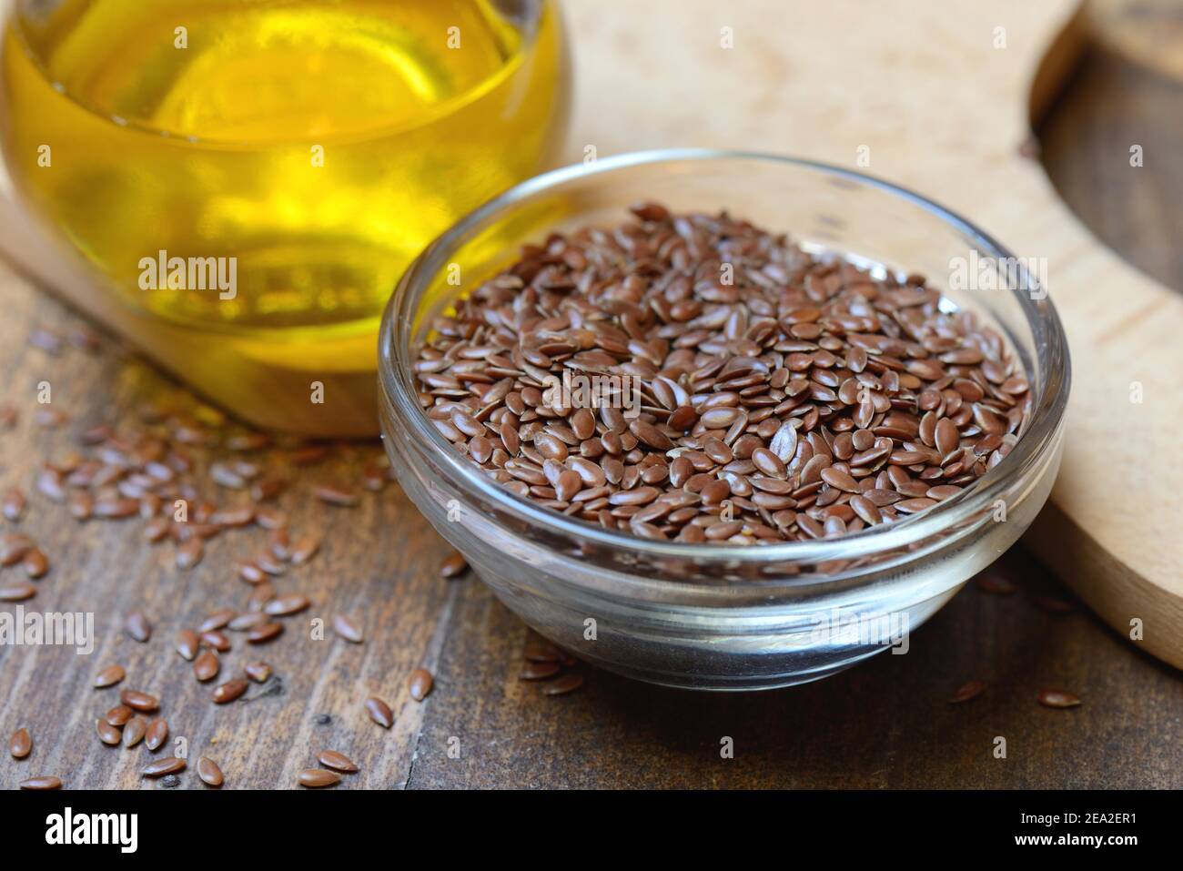 Linseed ( Linum usitatissimum) in husk and linseed oil Stock Photo - Alamy