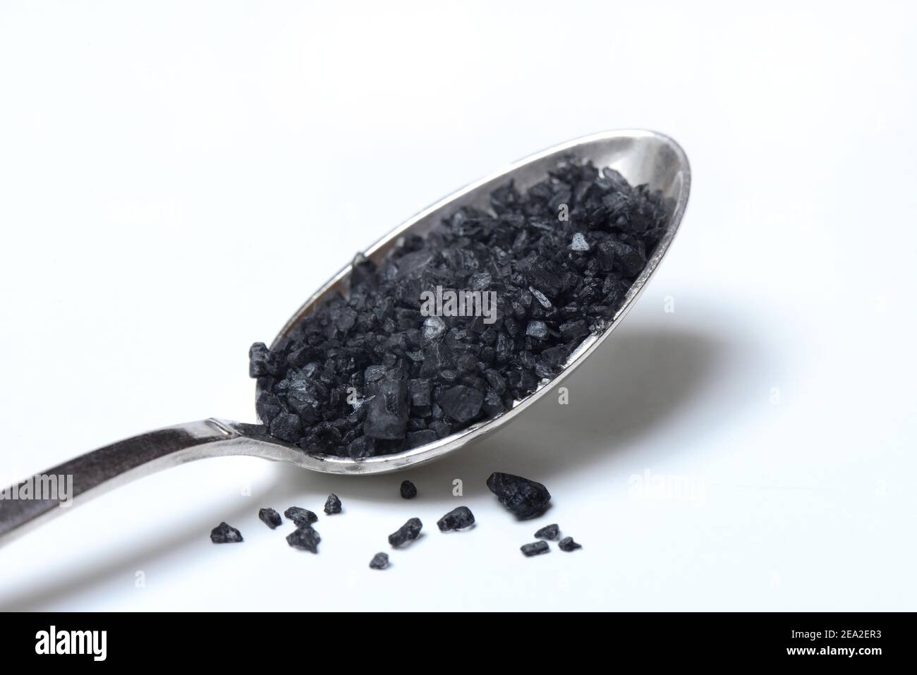 Black Hawaiian salt in spoon, lava salt, sea salt with activated carbon ...