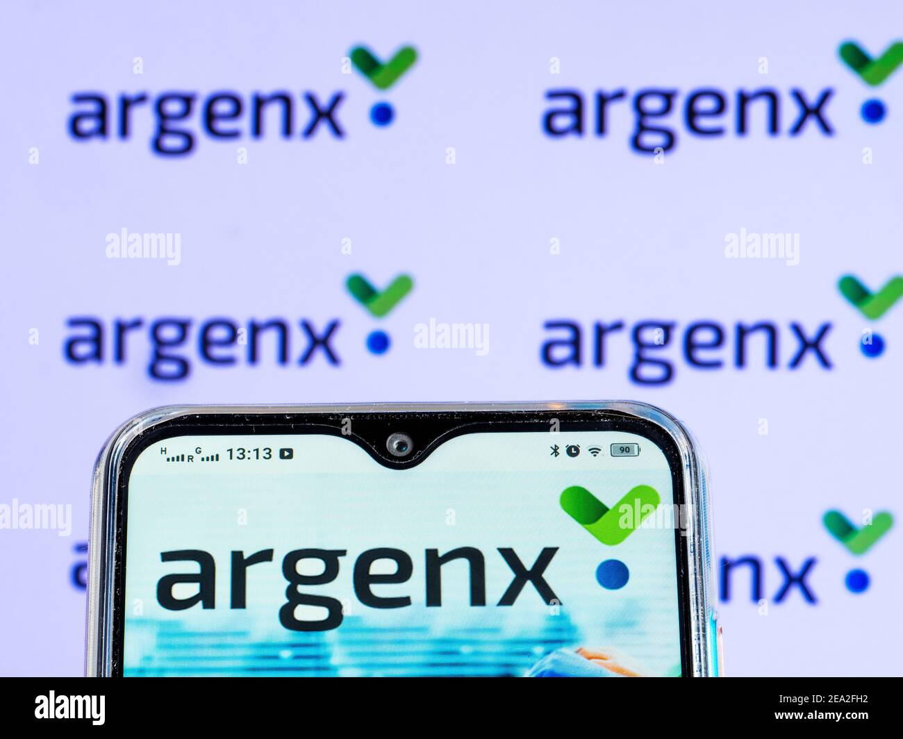 In this photo illustration an argenx SE logo seen displayed on a ...