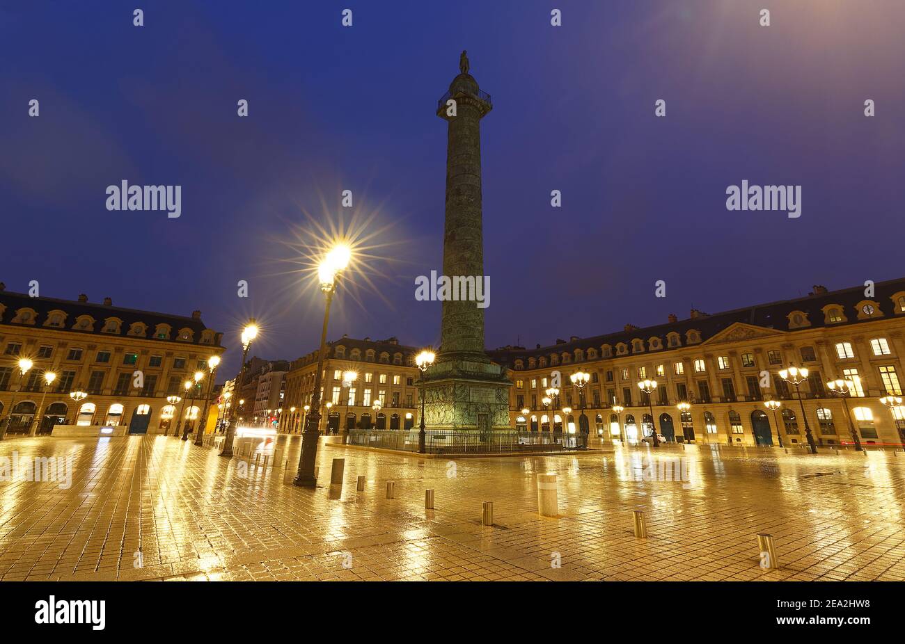 The Vendome column , the Place Vendome at rainy night, Paris, France ...