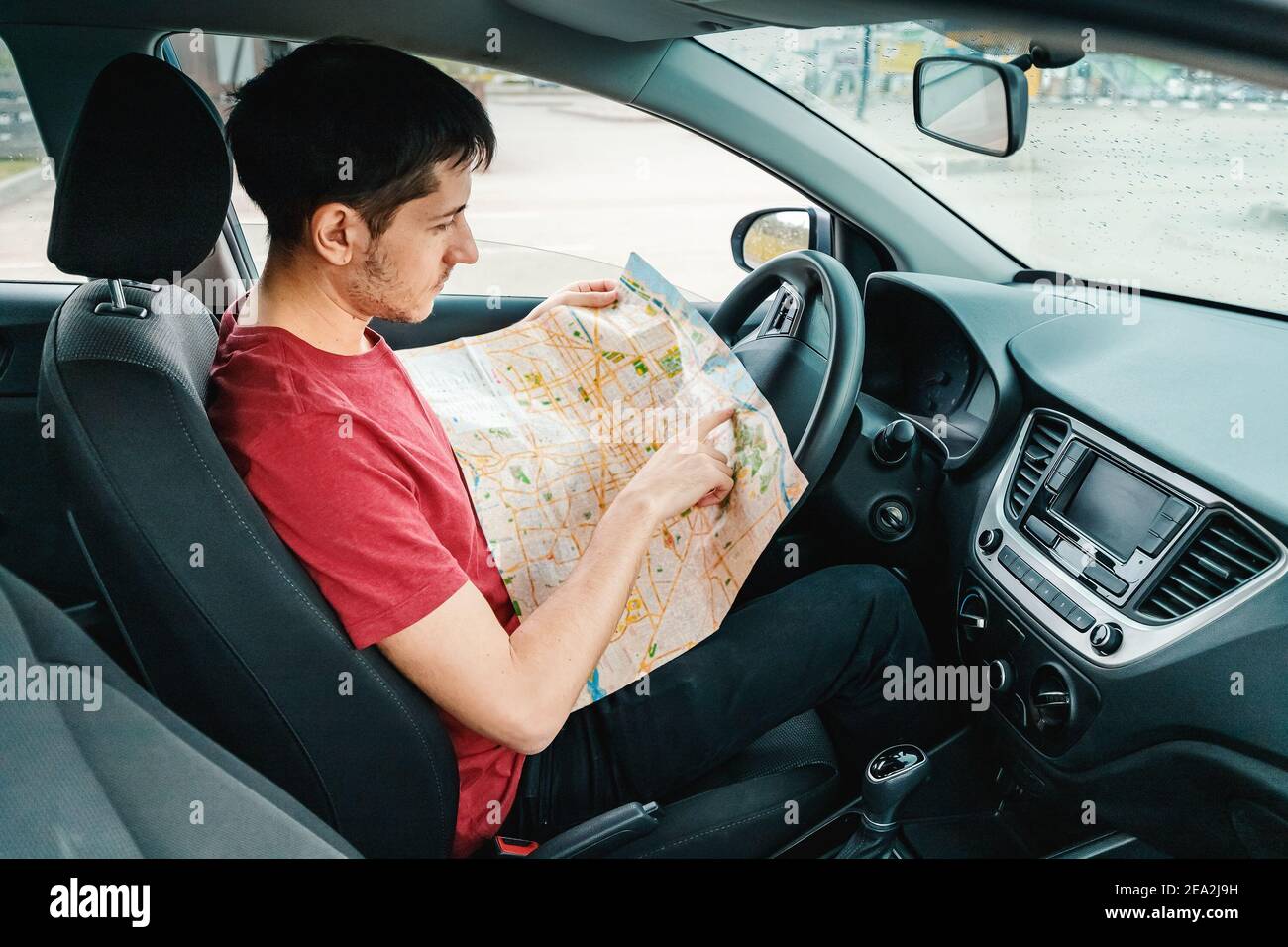 Reading map inside car hi-res stock photography and images - Alamy