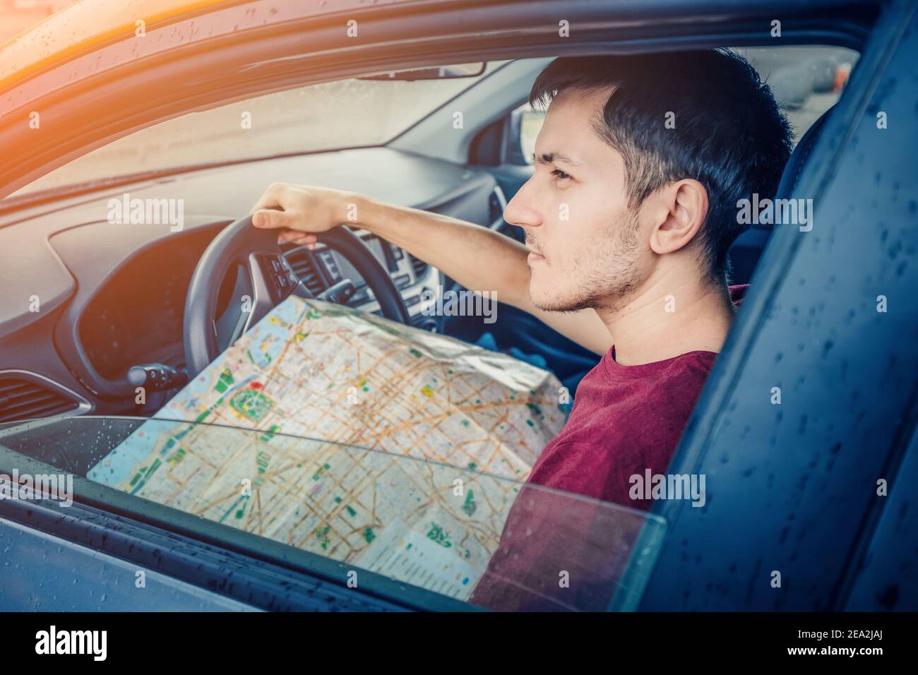 Reading map inside car hi-res stock photography and images - Alamy