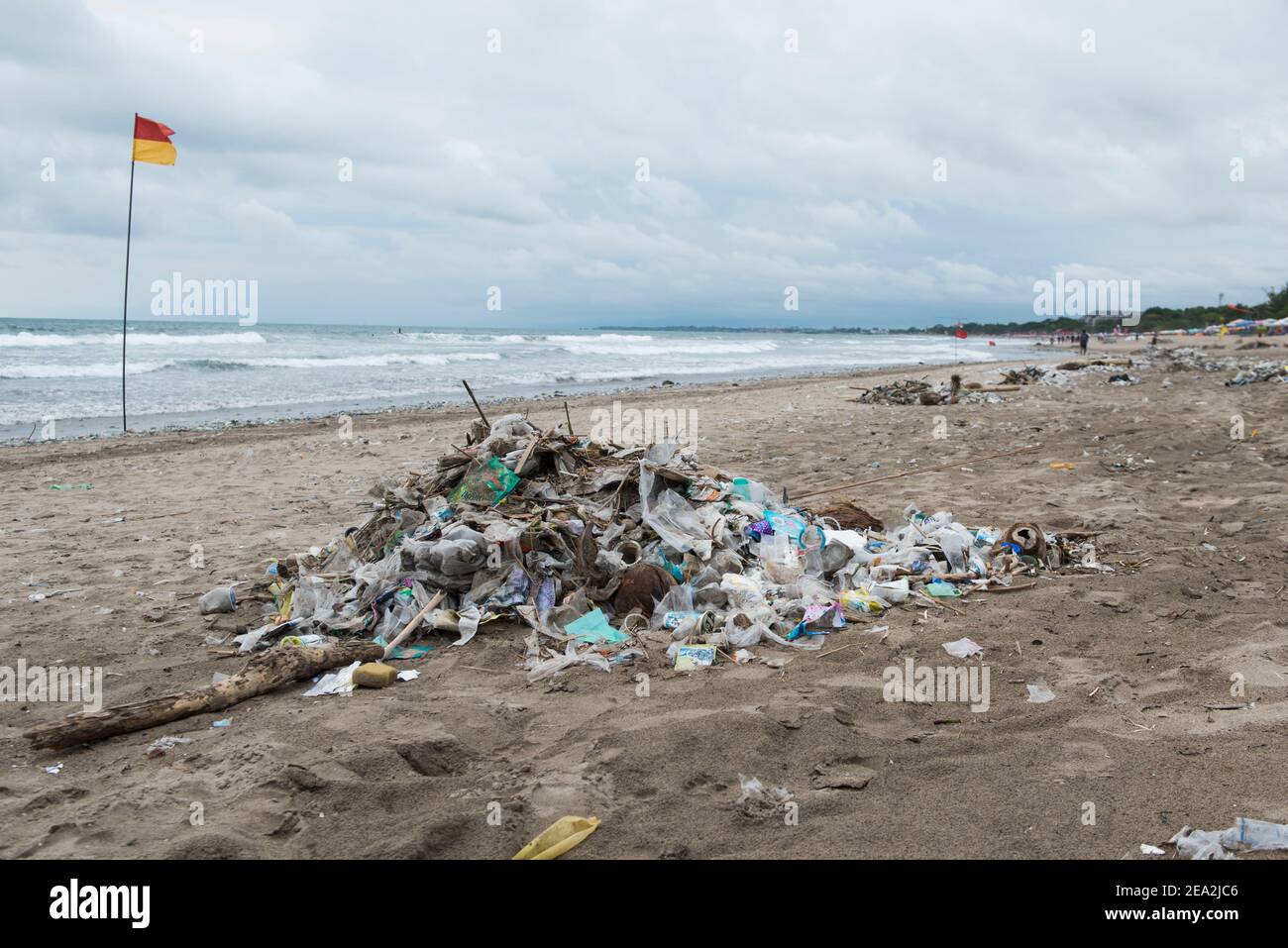 Piles of plastic and waste pollution washed up on a beach in Bali ...