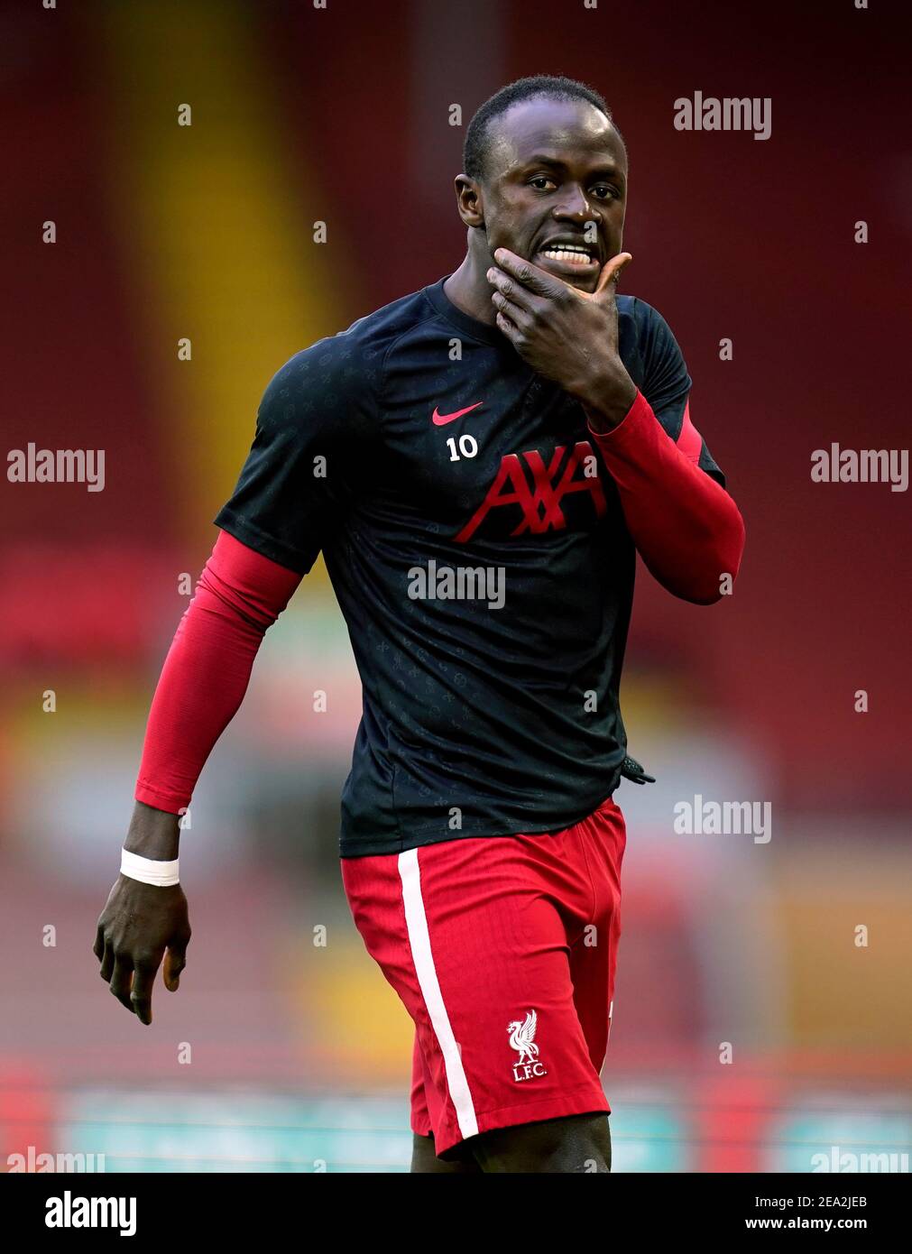 Liverpool's Sadio Mane warming up before the Premier League match at ...