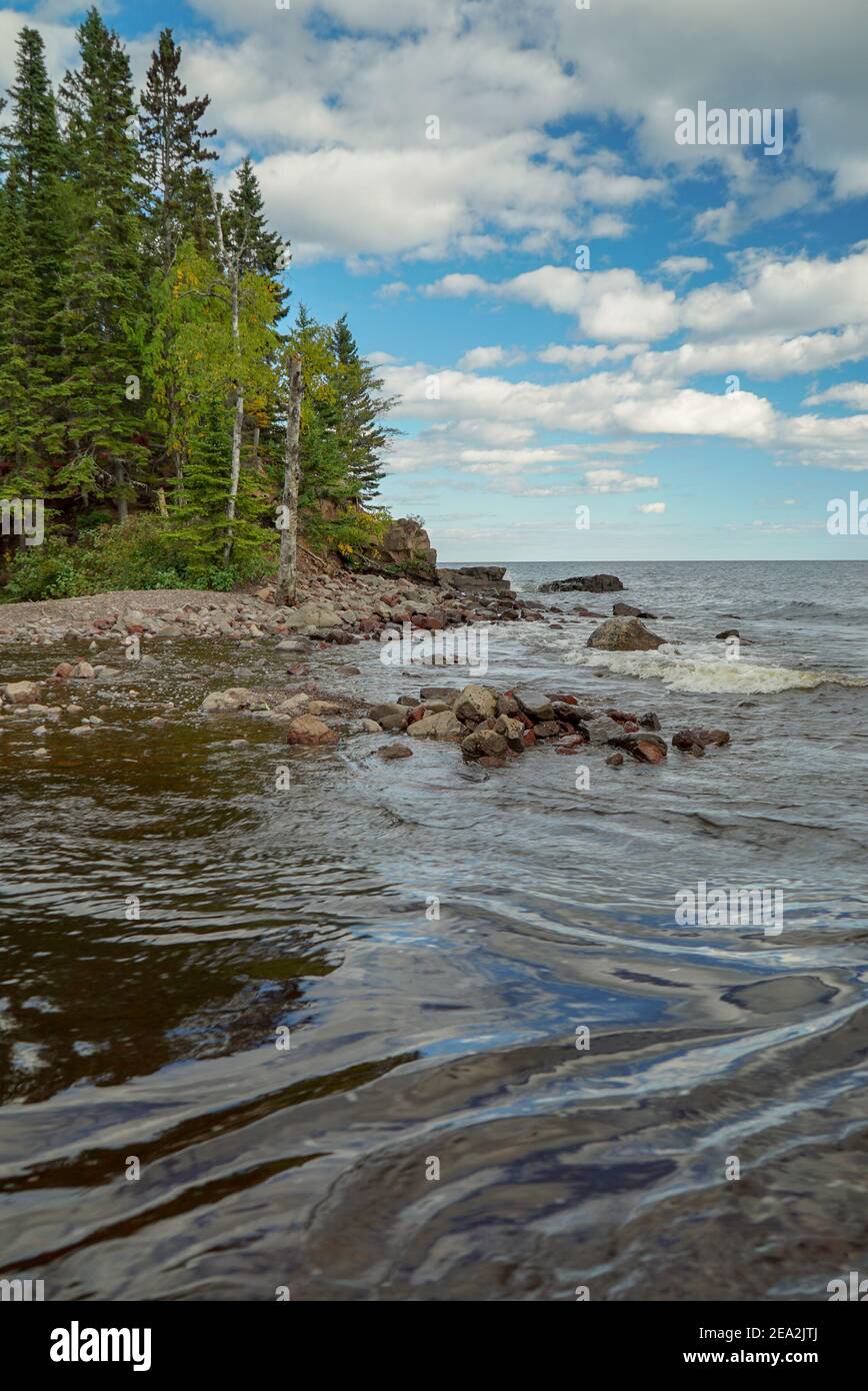 Clouds, Woods and Lake Superior Waves in Minnesota Stock Photo - Alamy
