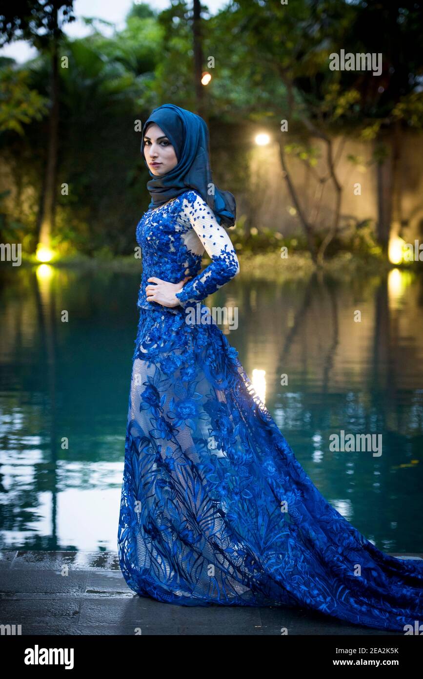 Model dressed in Modest fashion designed by Mira Indria in Surabaya ...