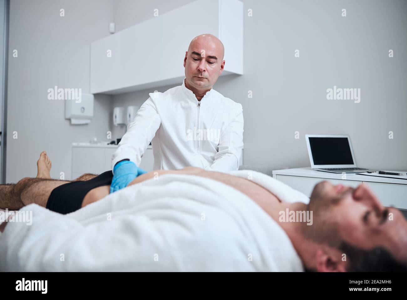 Bald doctor hi-res stock photography and images - Alamy