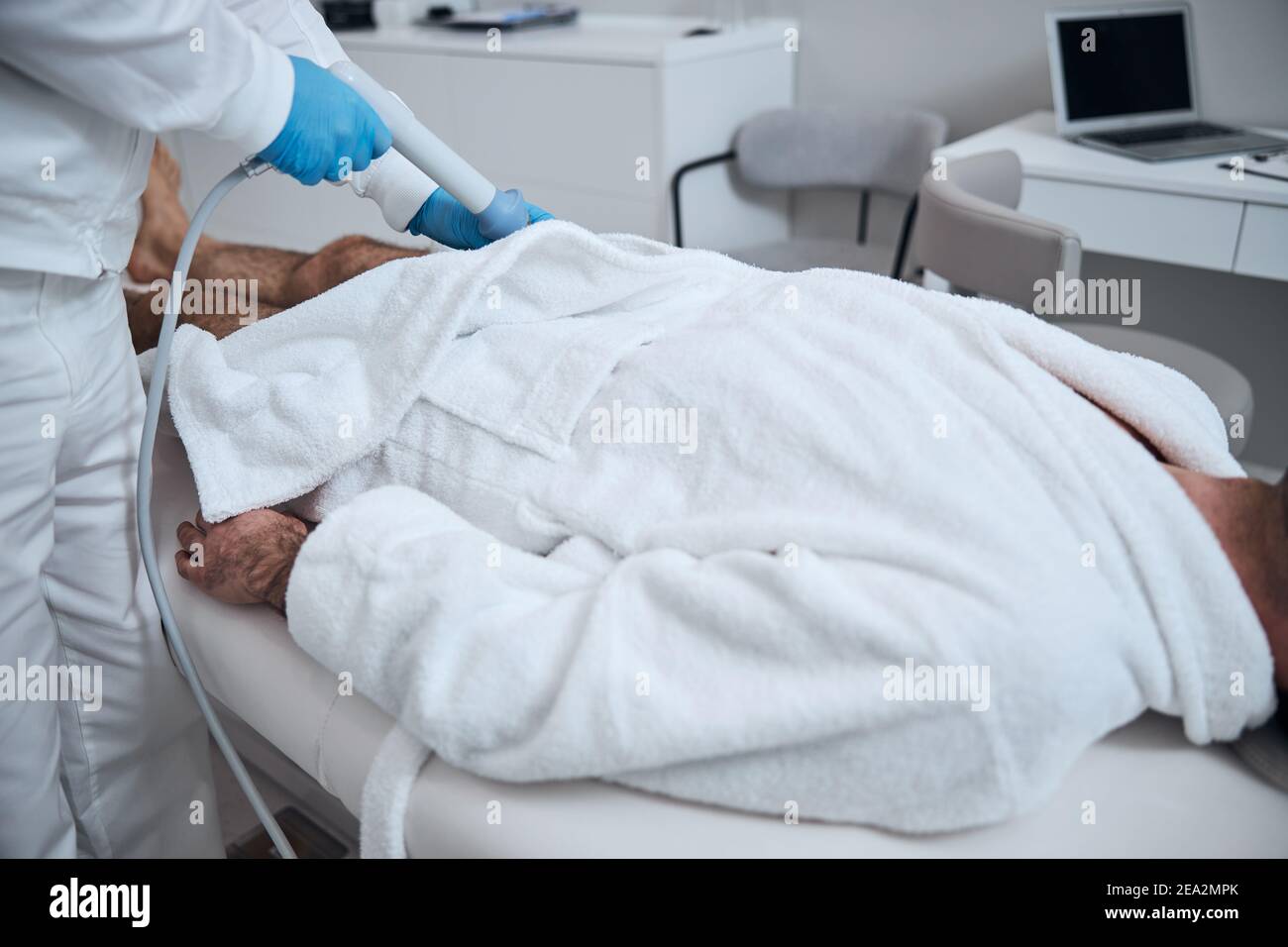 Doctor Treating Patient High Resolution Stock Photography and Images ...