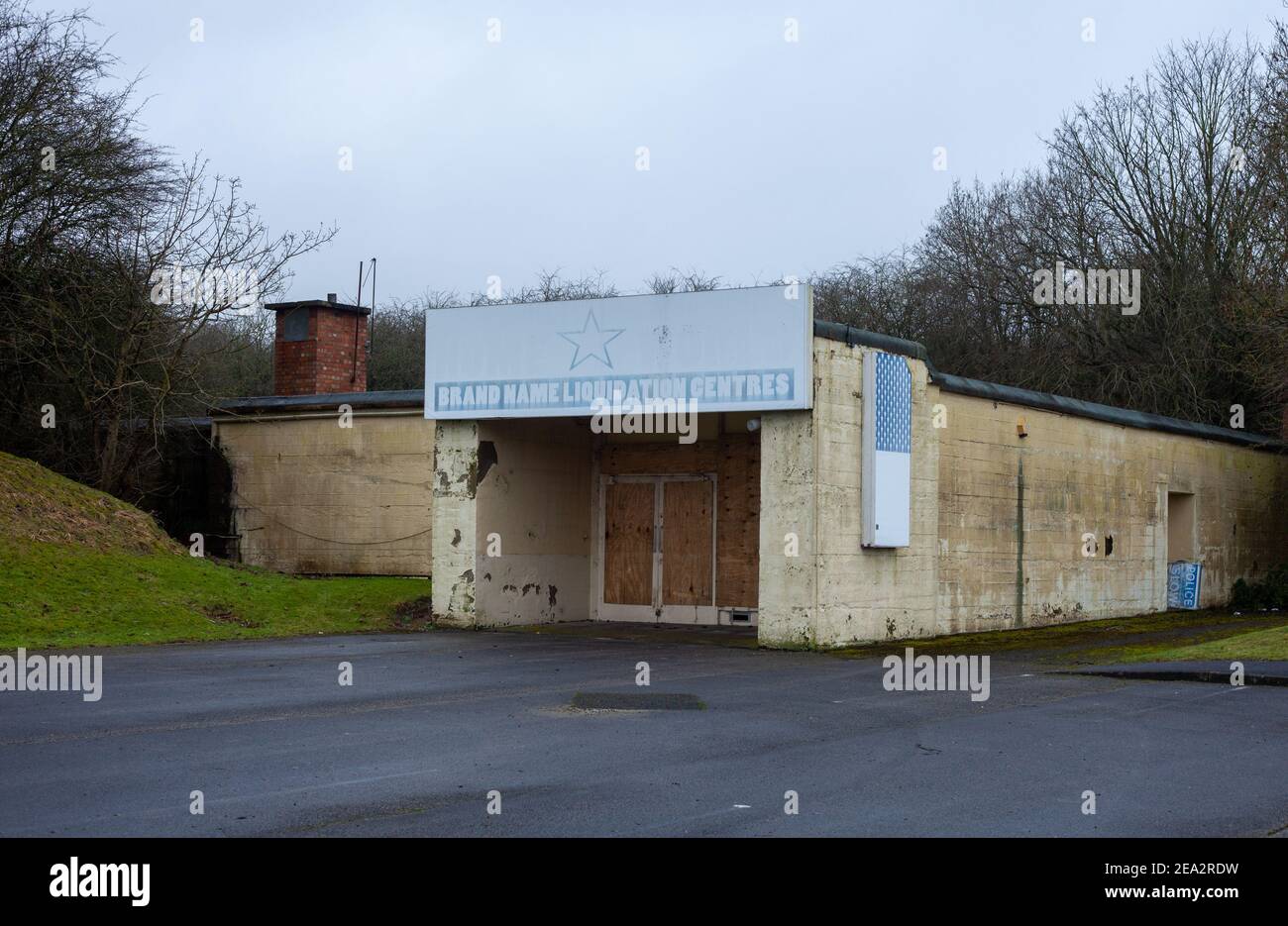 Closed and boarded up retail unit at the Buywell Shopping Centre in ...