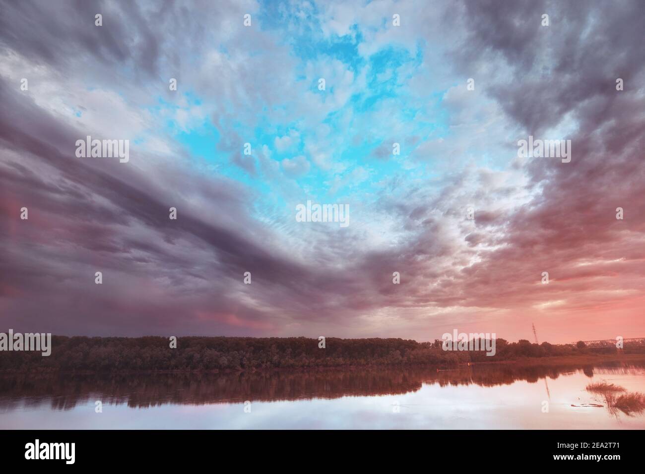 Beautiful and quiet river or lake and sunset sky. Fishing and natural ...