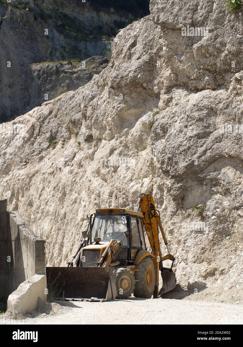 JCB digger at quarry at Troumpeta, Corfu, Greece Stock Photo - Alamy