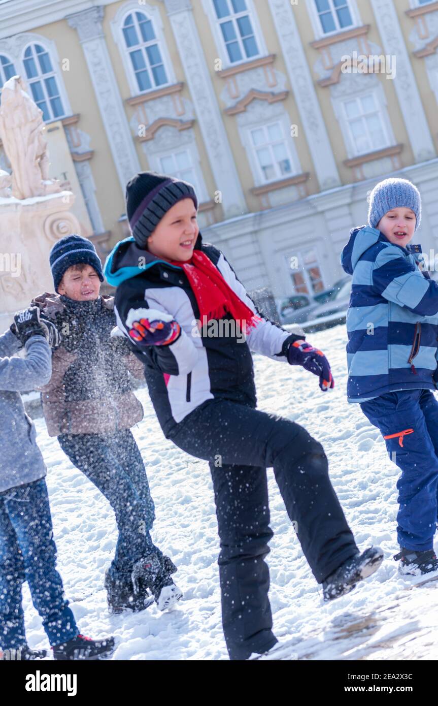 Timisoara, Romania - January 30, 2014: Kids playing with snow in the ...