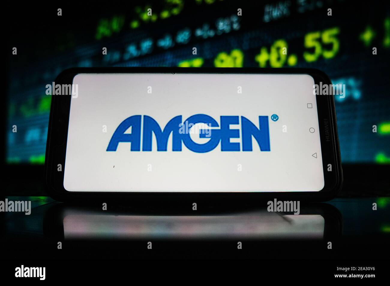 In this photo illustration an Amgen logo seen displayed on a smartphone ...