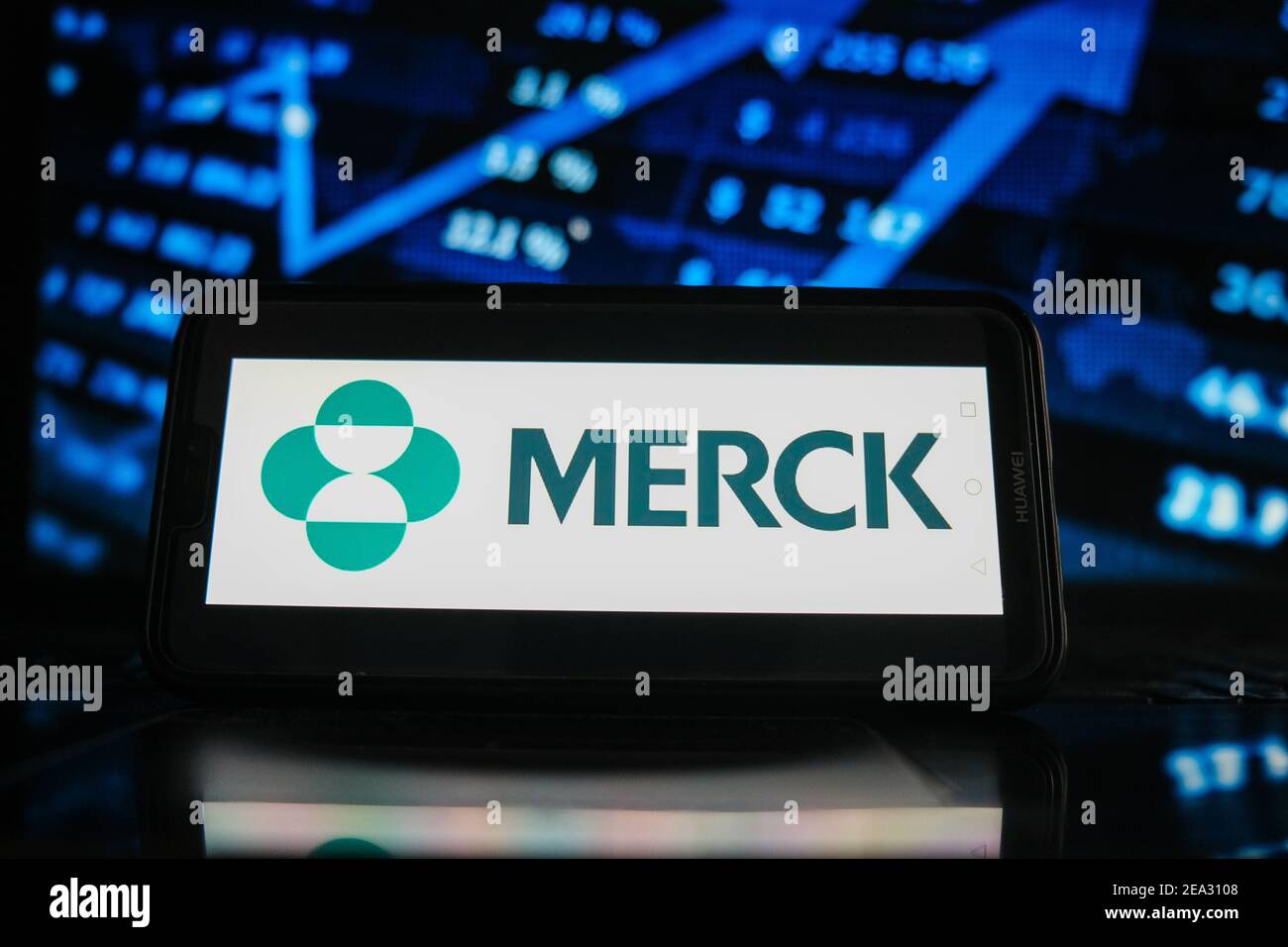 In this photo illustration a Merck logo seen displayed on a smartphone ...