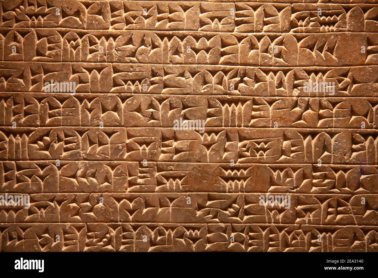 Ancient sumerian stone carving with cuneiform scripting Stock Photo - Alamy