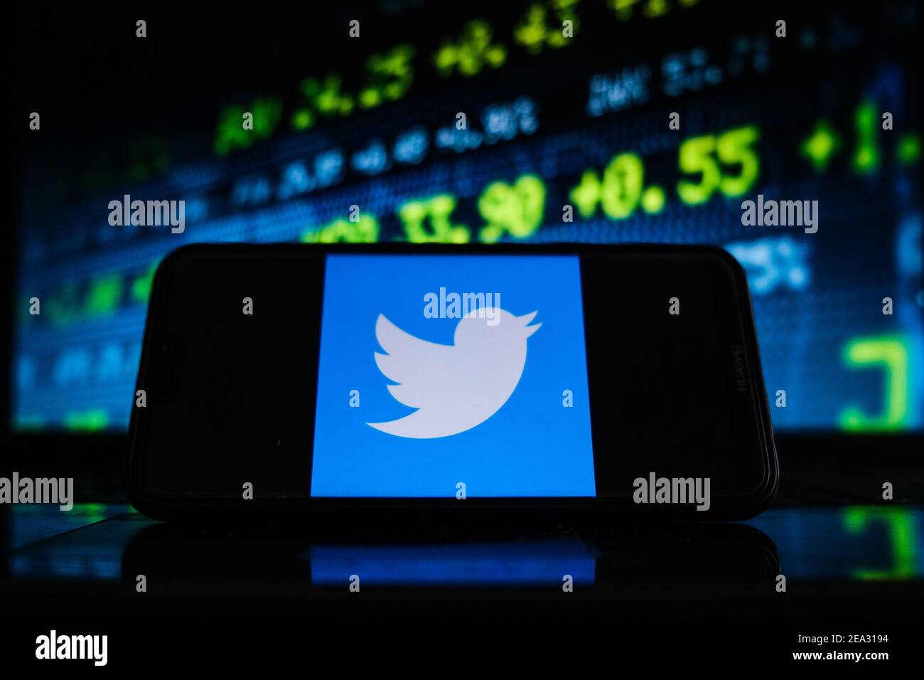 In this photo illustration a Twitter logo seen displayed on a ...